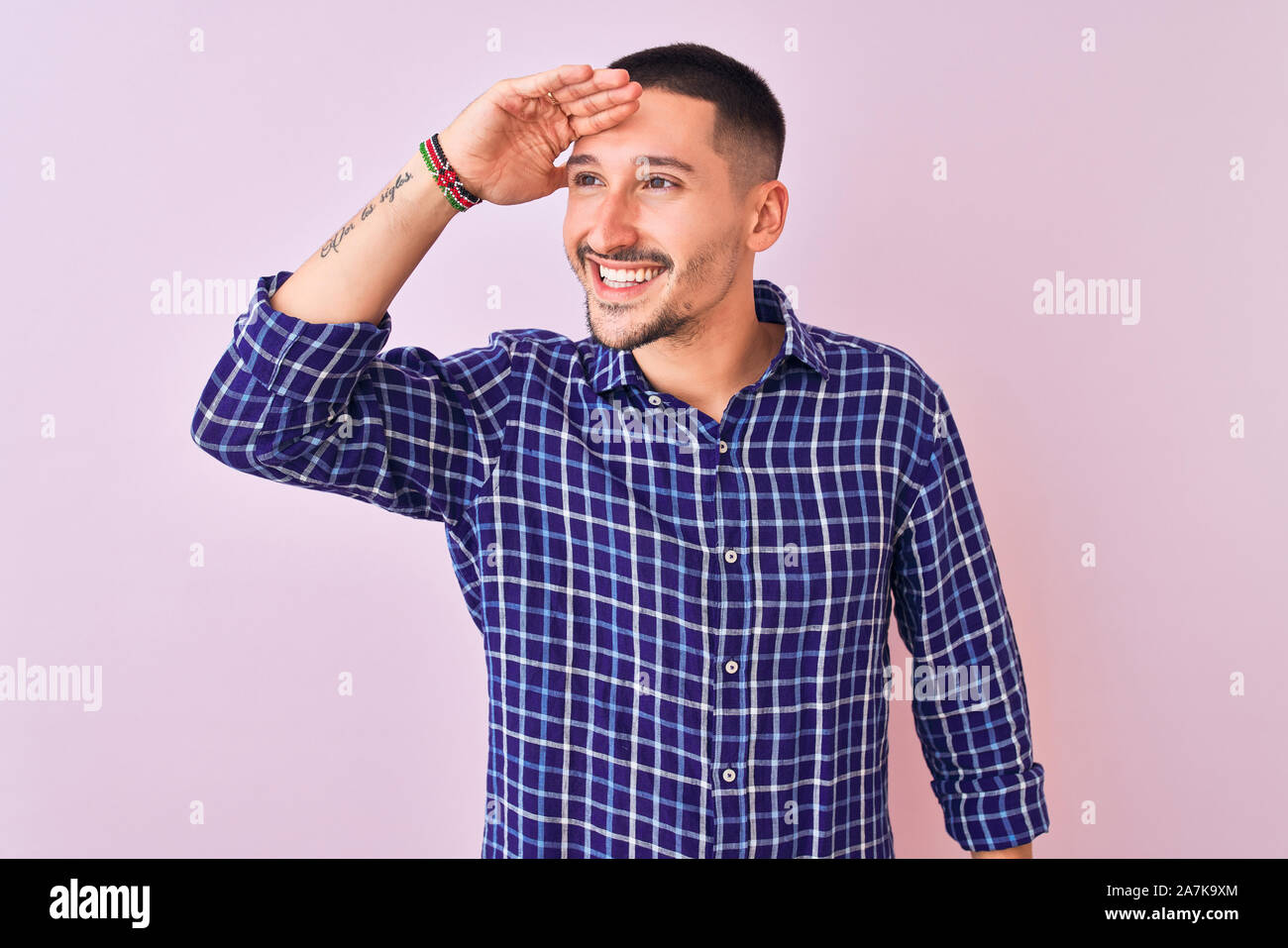 Young handsome man standing over isolated background very happy and ...