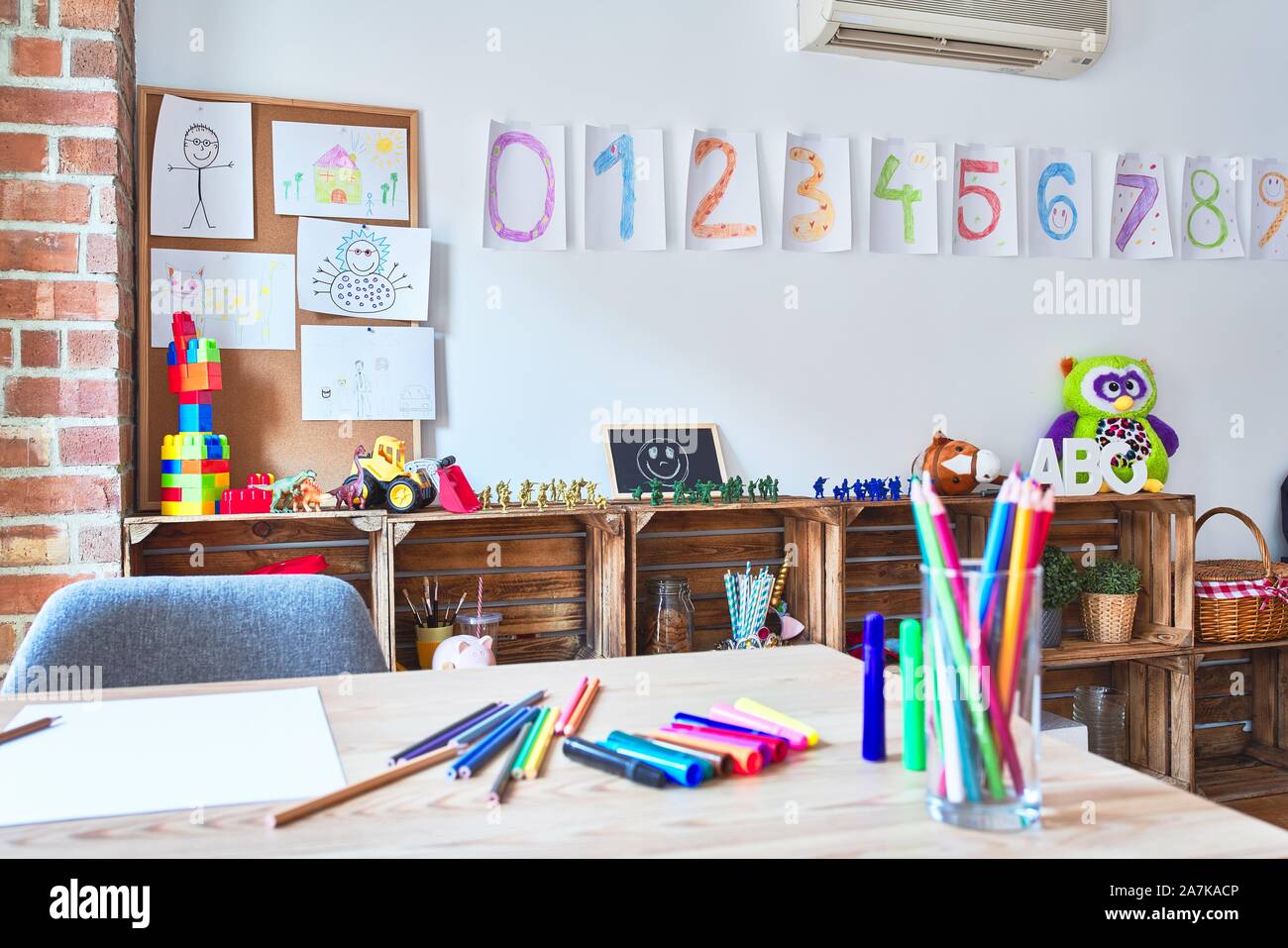 Beautiful games corner and desk at kindergarten Stock Photo - Alamy