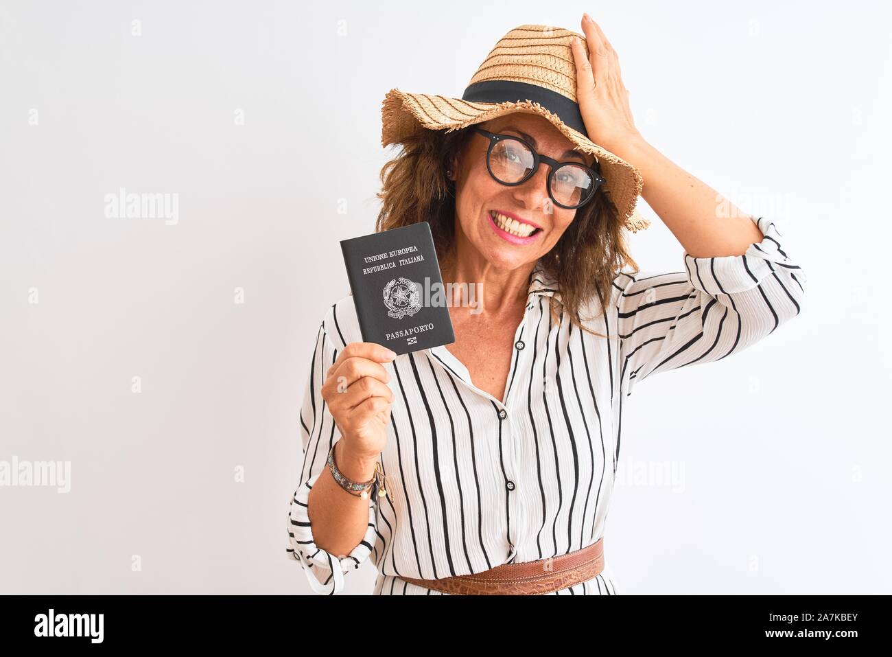 Senior tourist woman holding Italy Italian passport standing over ...