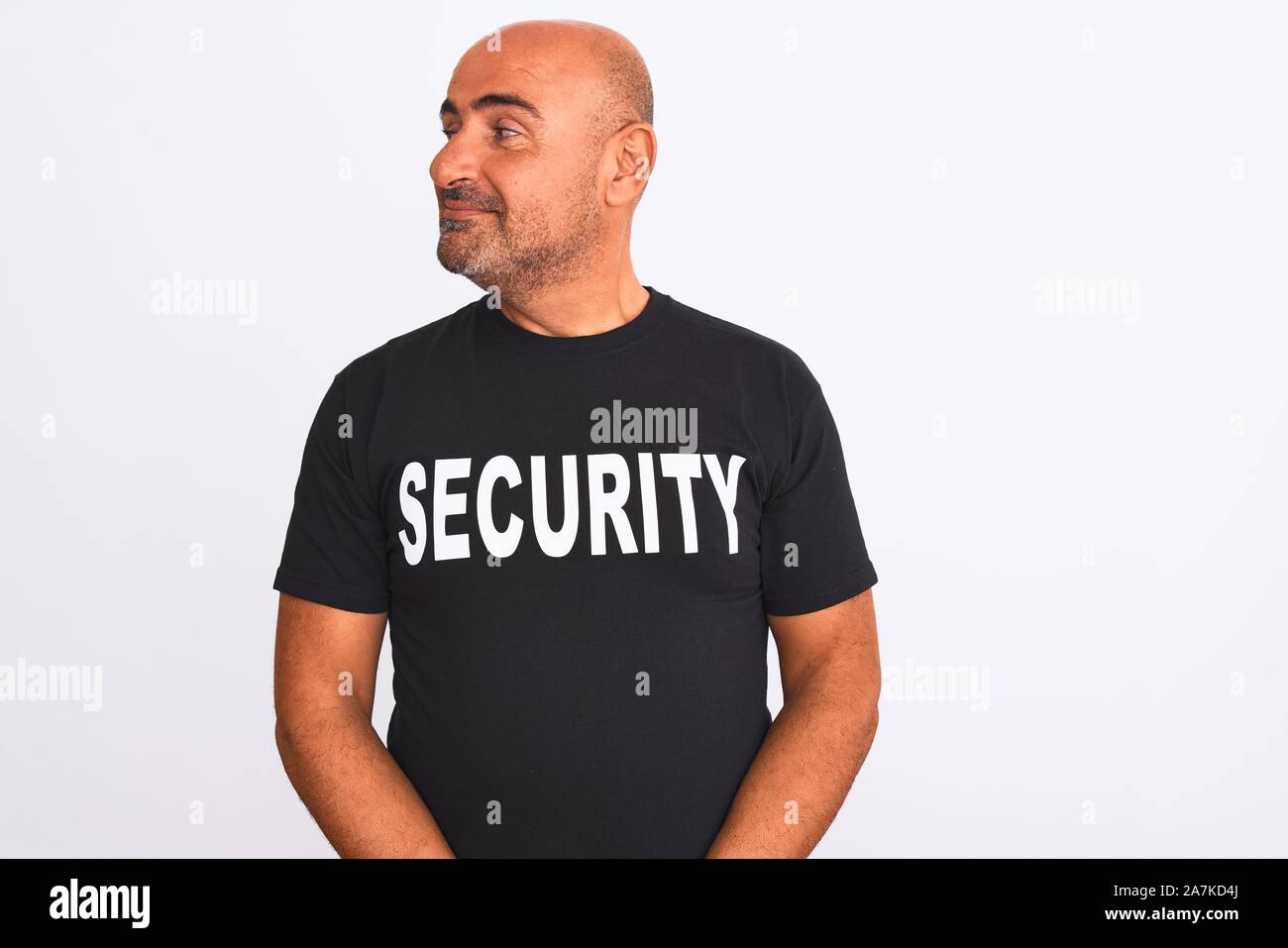 Middle age safeguard man wearing security uniform standing over ...