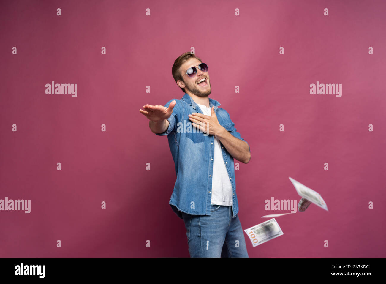 Happy rich man throwing money hi-res stock photography and images - Alamy