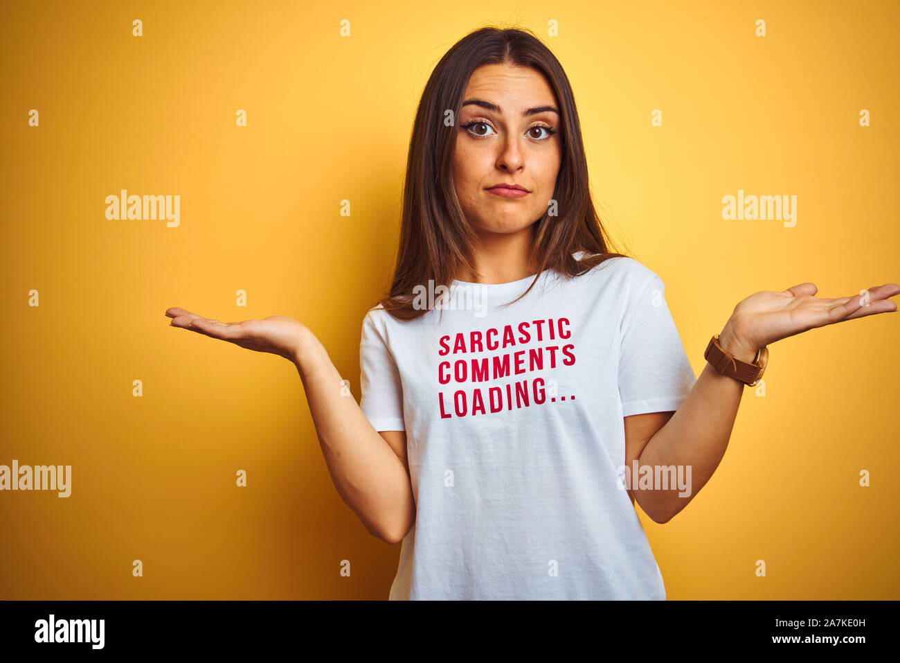 Beautiful woman wearing fanny t-shirt with irony comments over isolated ...