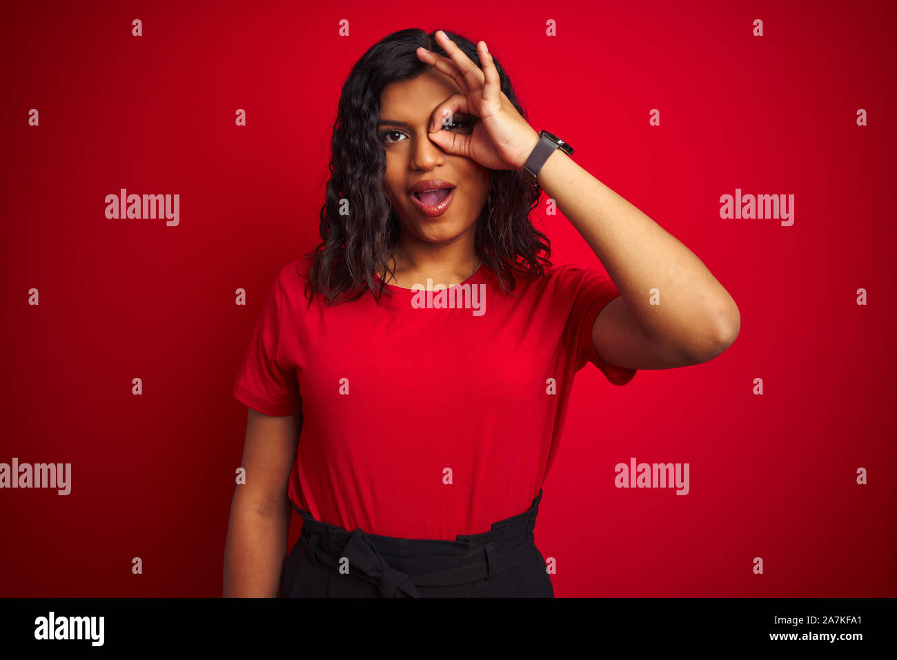 Beautiful transsexual transgender woman wearing t-shirt over isolated ...