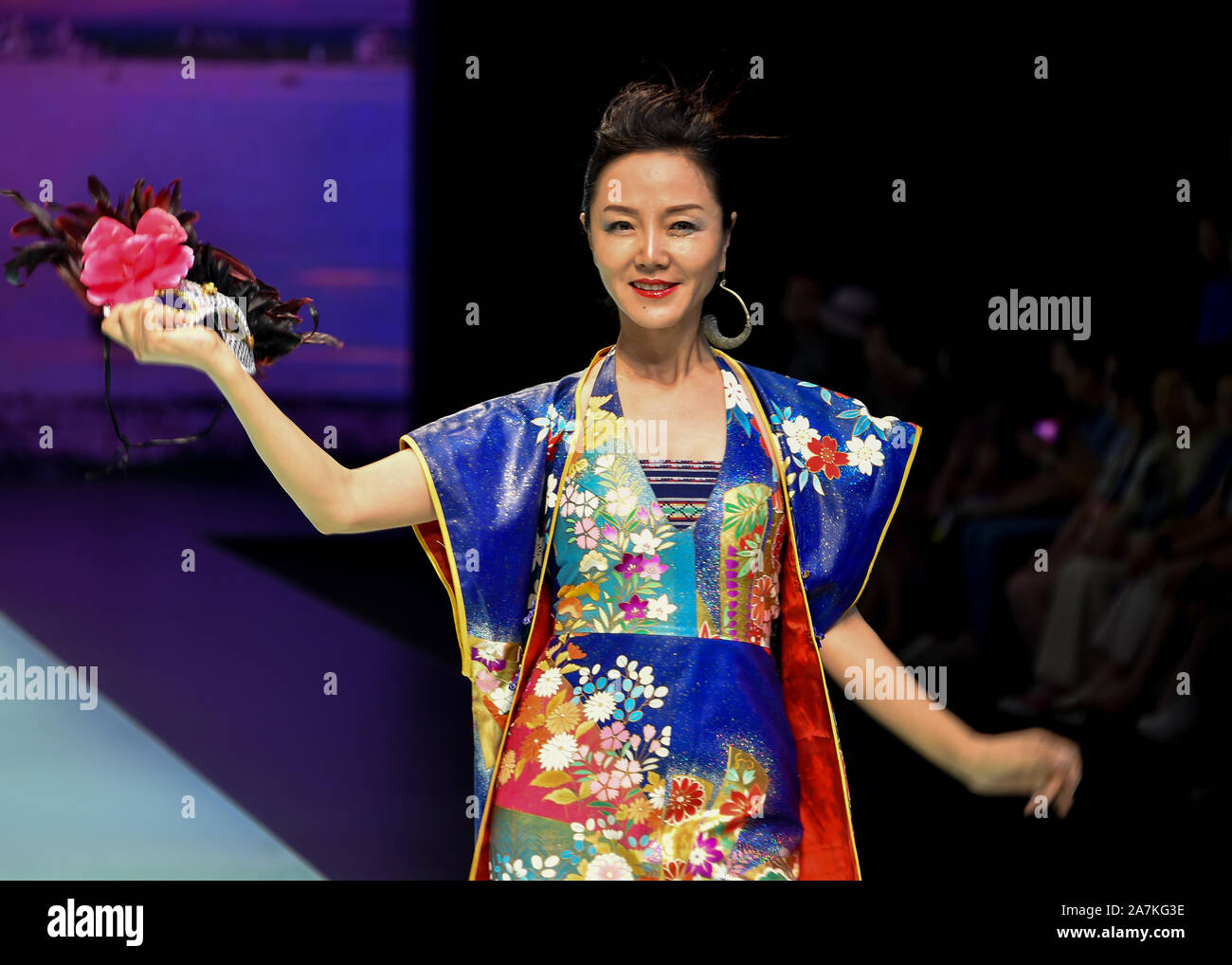 Elder models wearing traditional Chinese outfit designed by Chen Fumei ...