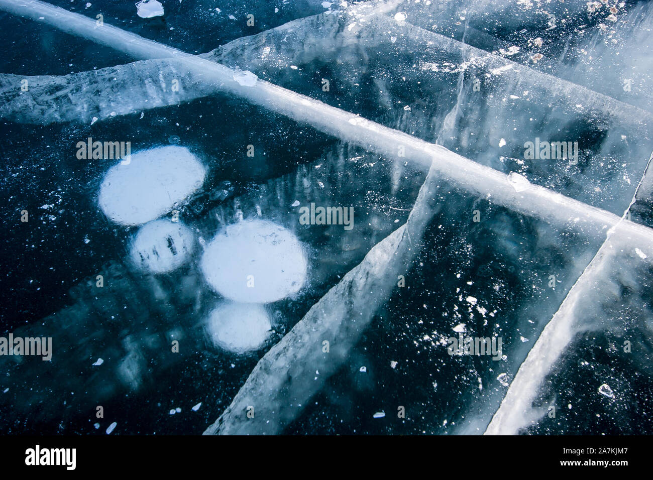 Natural texture background, transparent ice with air bubbles under the ...