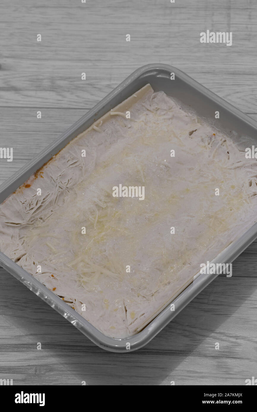 Frozen beef lasagne, or lasagna, in a plastic tray packaging. Frozen ...