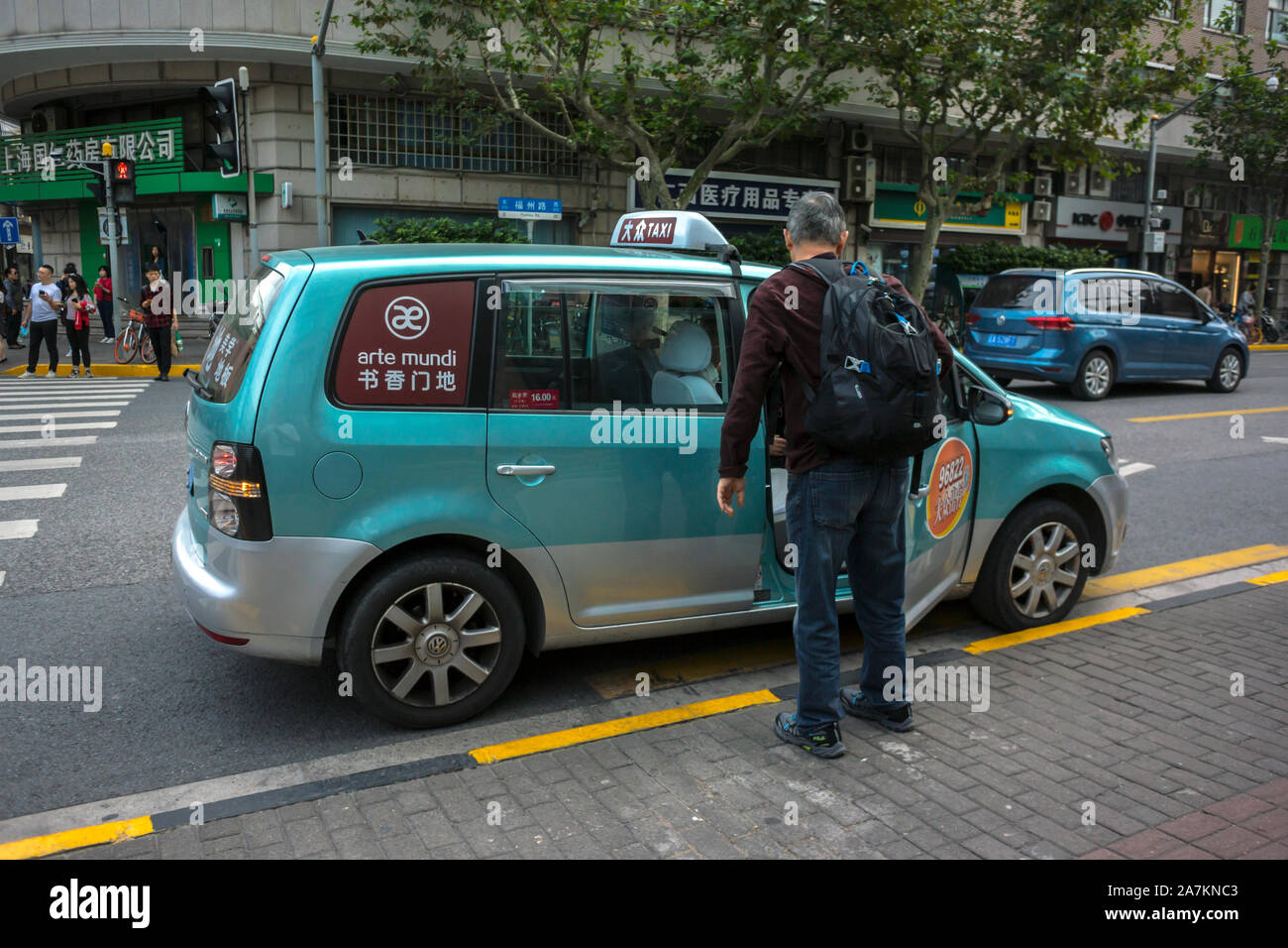 Shanghai, China, Man rear, Hailing Taxi, Chinese city Street Scenes ...