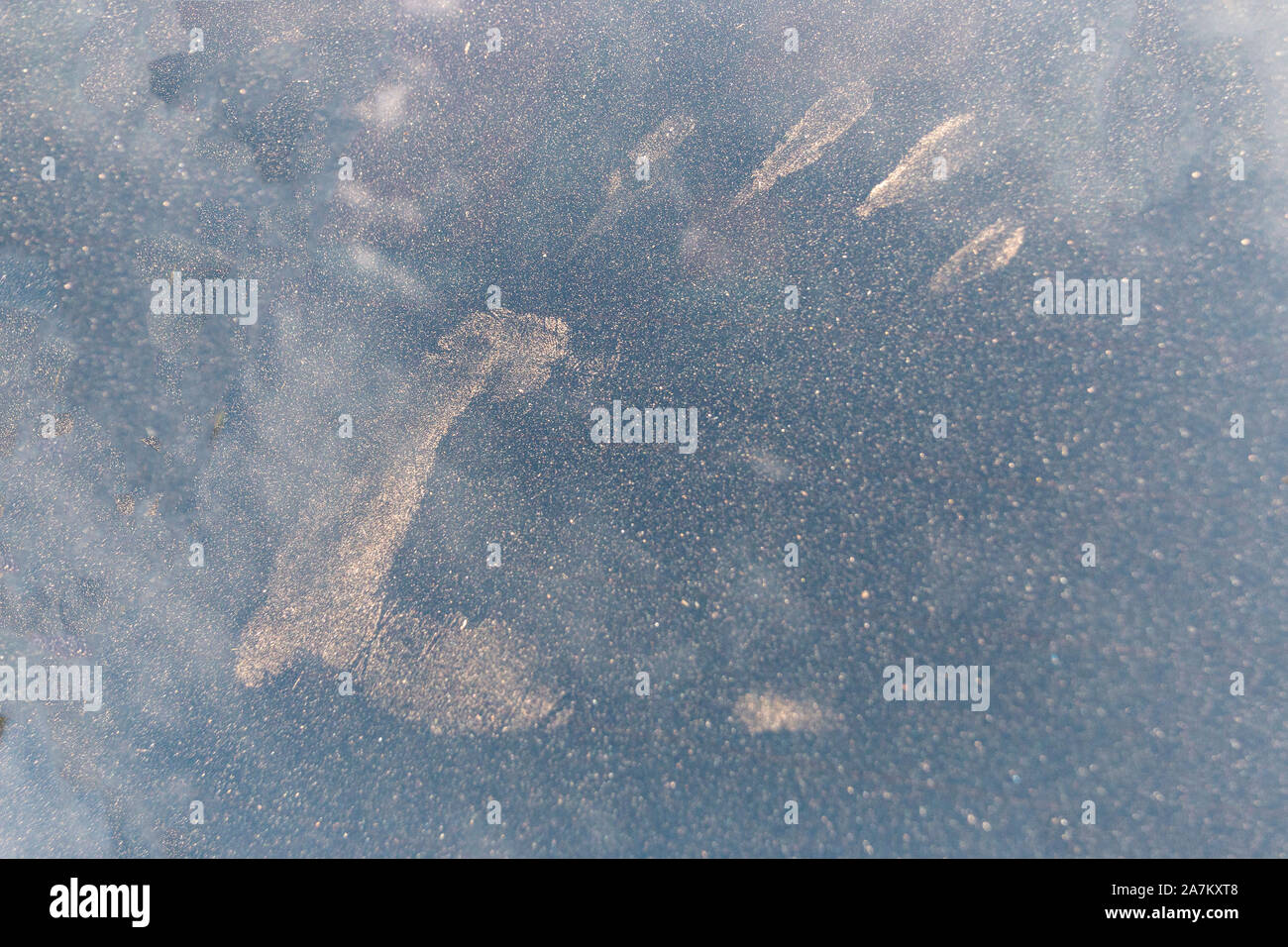 A close up view of a hand print on a very dirty and dusty window Stock ...