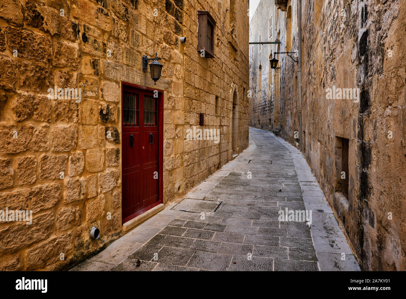 Ancient city of Mdina in Malta, shady, narrow street and medieval stone ...