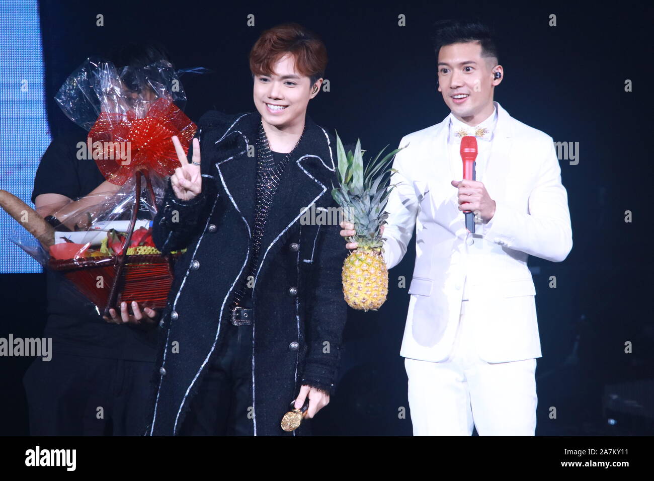 Hong Kong singer and songwriter Hins Cheung, left, appears and sings at ...