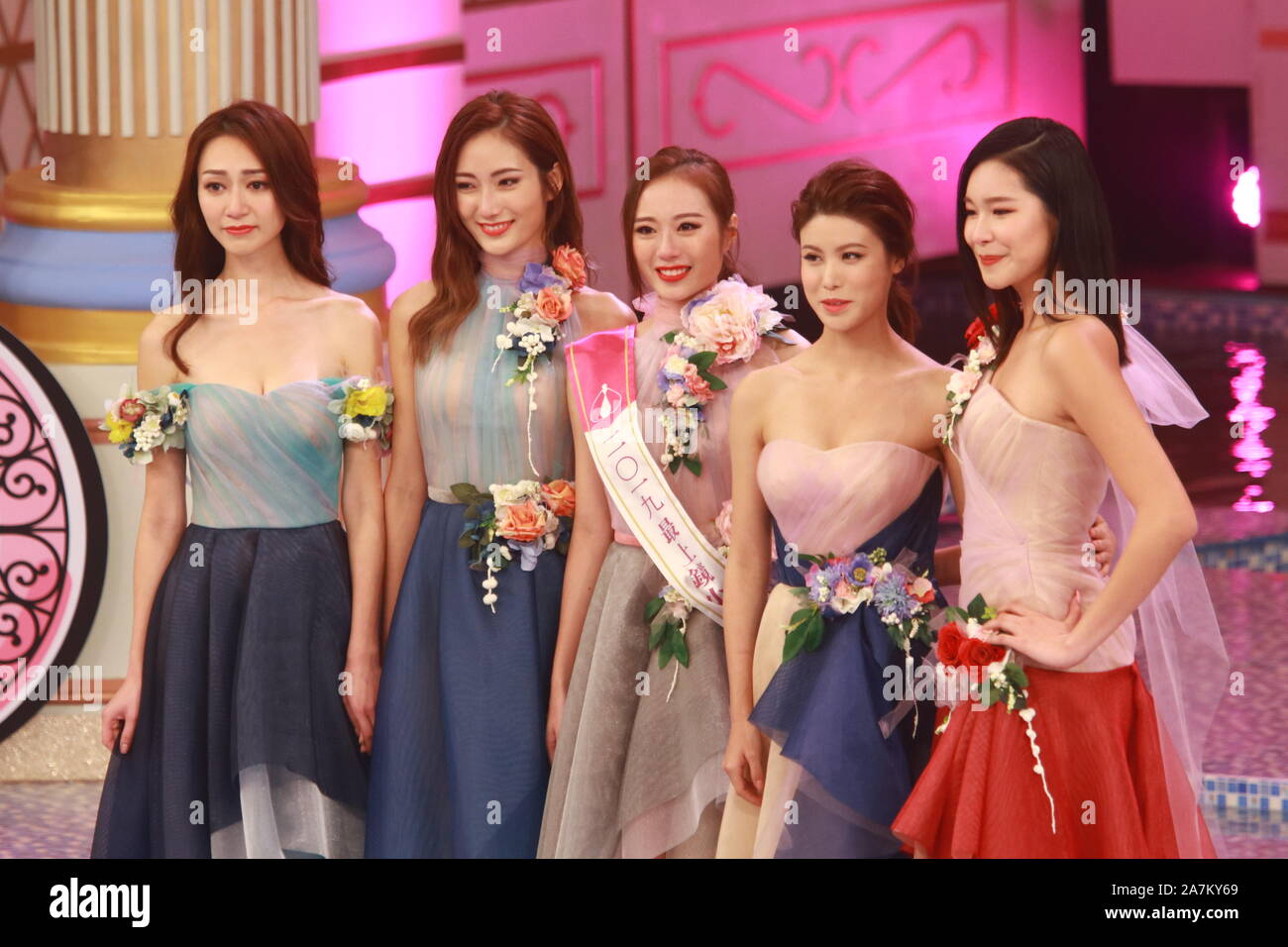 Miss Photogenic Fei Wong, center, and other contestants pose during the ...