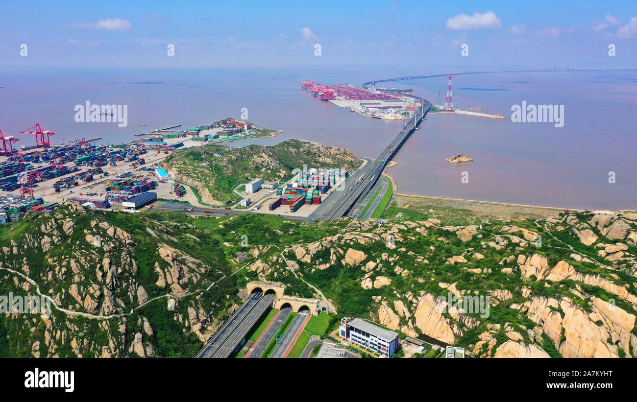An aerial view of seacoast and harbor at Yangshan Port, a deep water ...