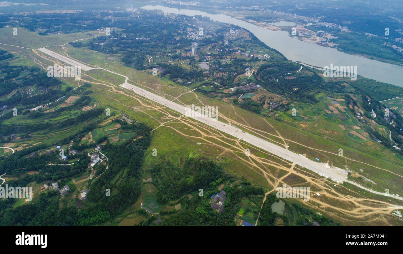 Aerial view of the Langzhong Airport under construction in Shilong town ...