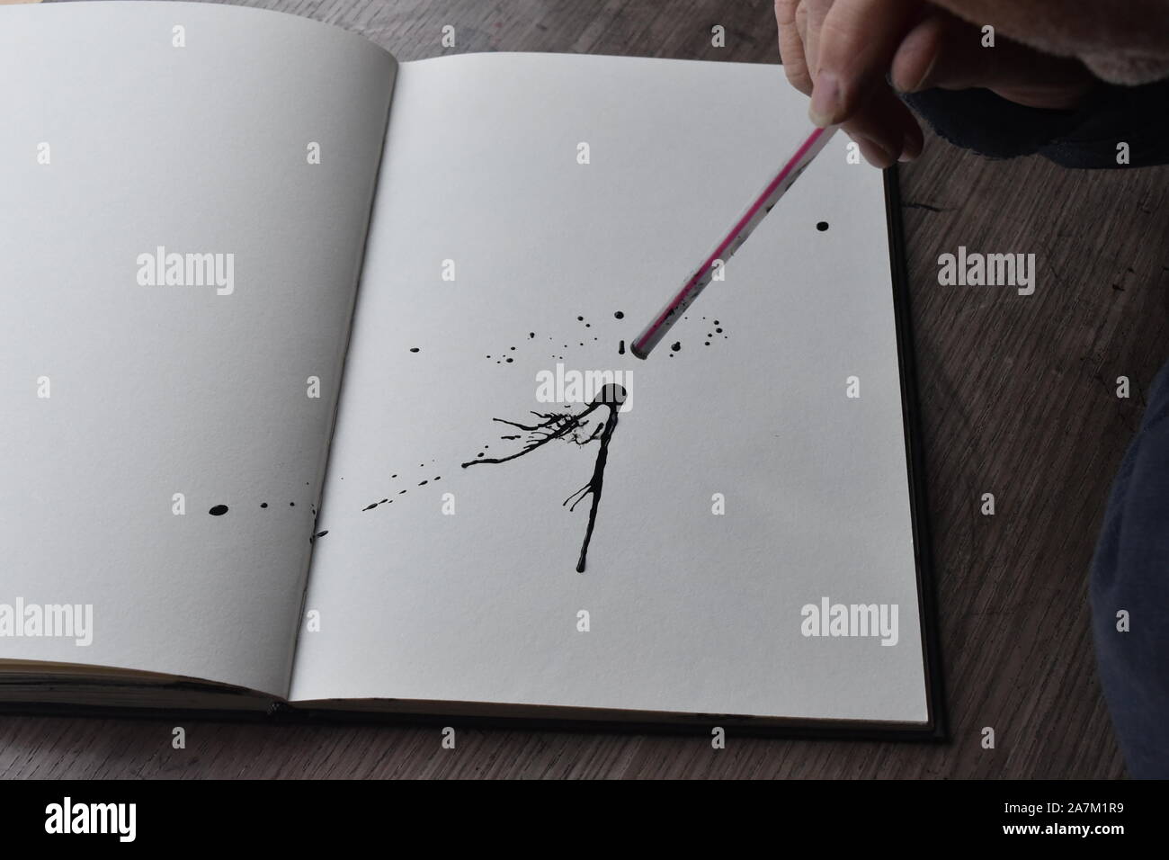 Ink being blown by straw on paper, series of pics in a sequence Stock ...