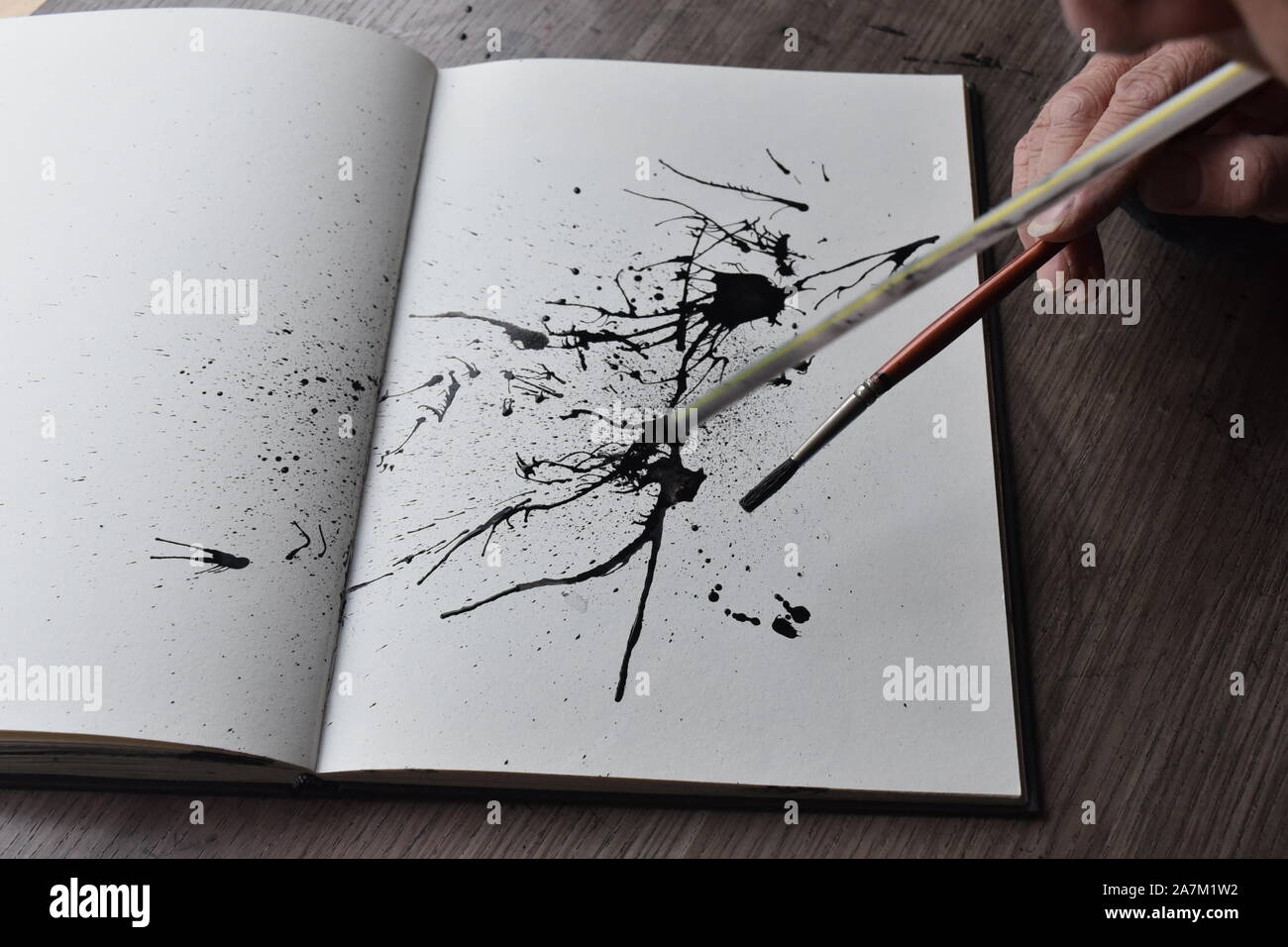 Ink being blown by straw on paper, series of pics in a sequence Stock ...