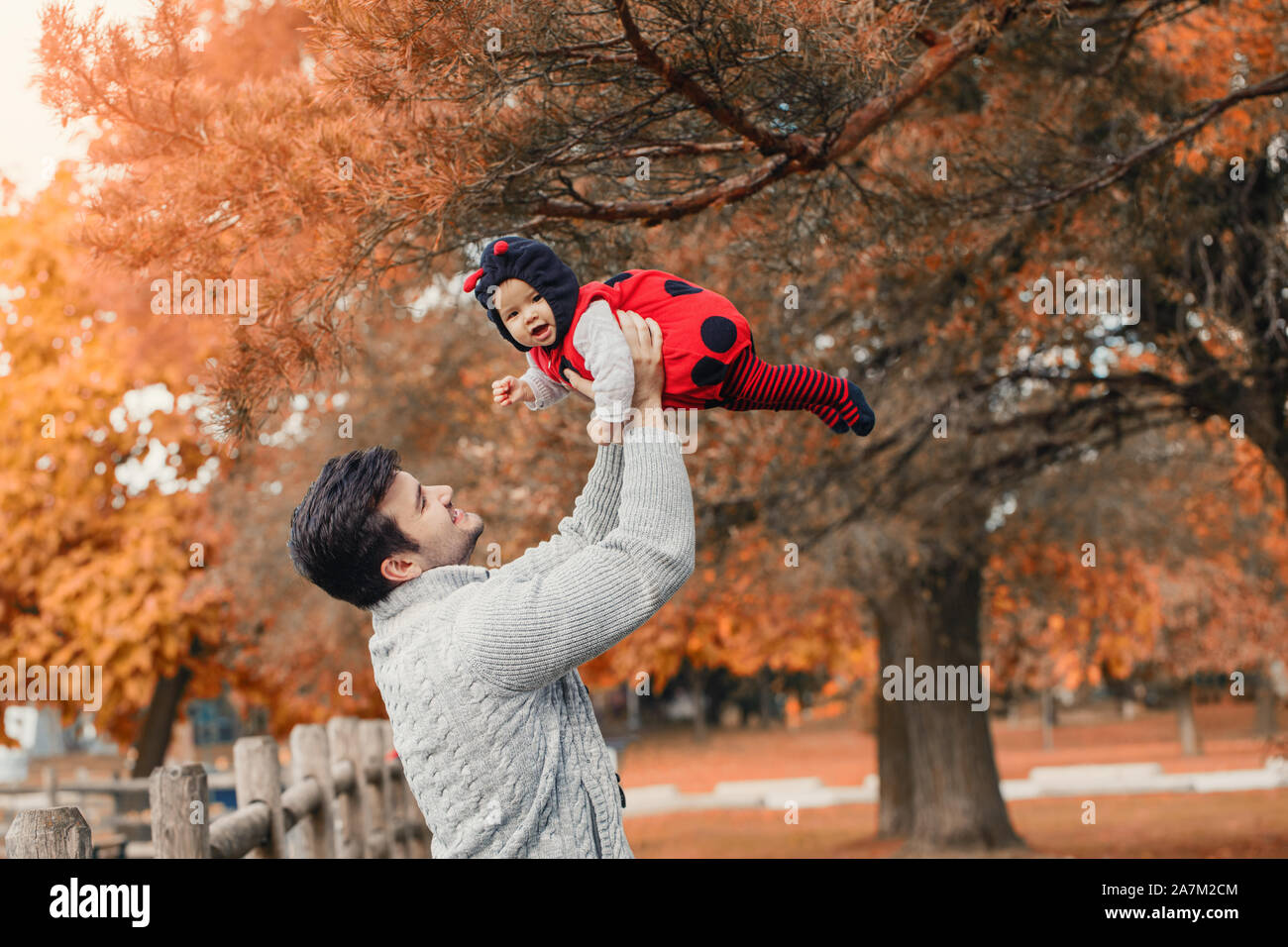 Happy smiling Caucasian father dad with cute adorable baby girl in ...