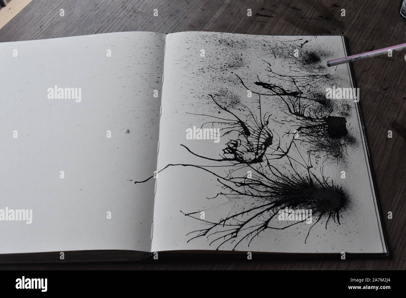 Ink being blown by straw on paper, series of pics in a sequence Stock ...