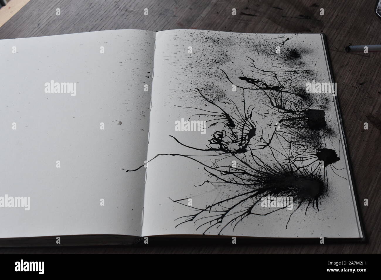 Ink being blown by straw on paper, series of pics in a sequence Stock ...