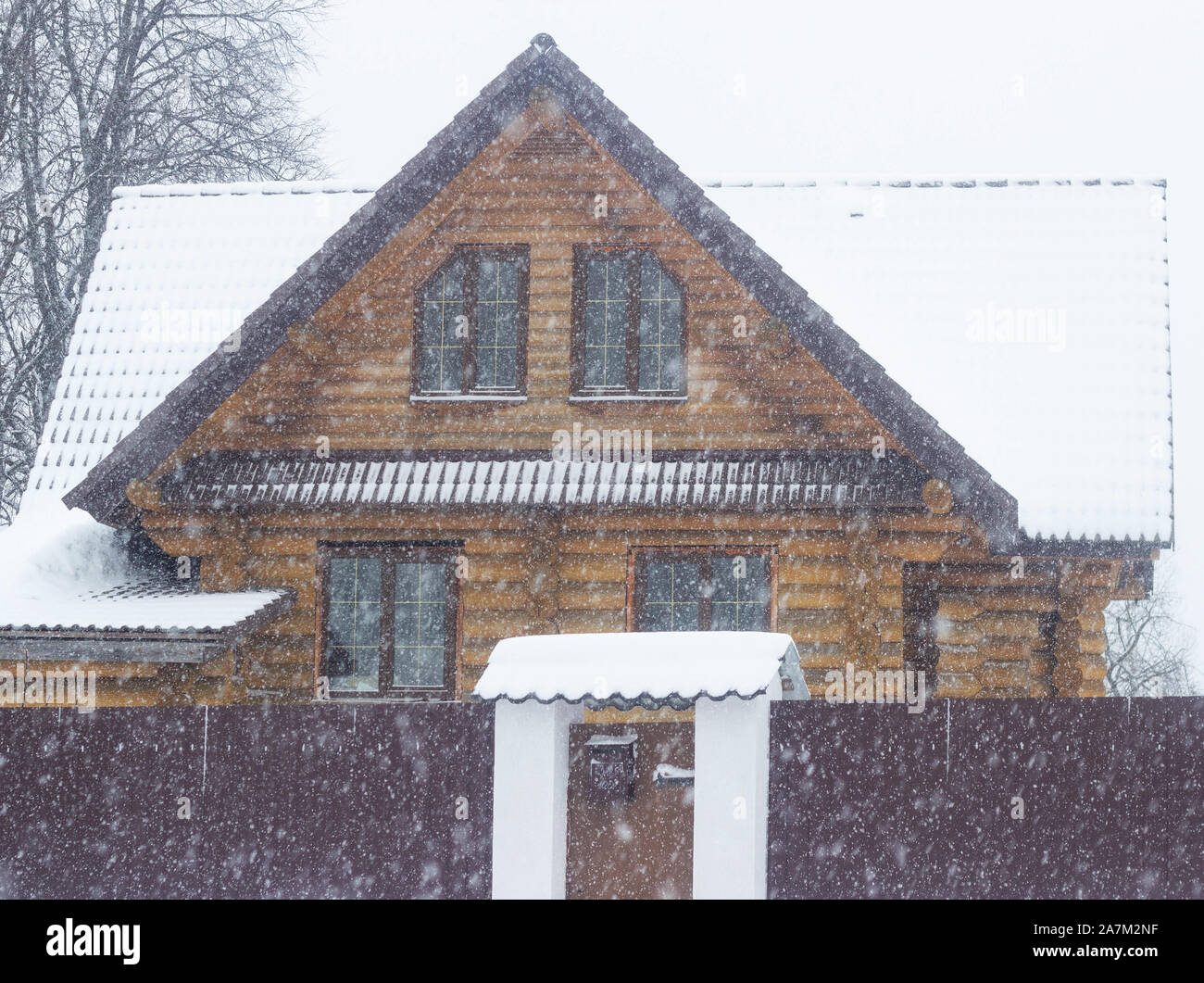 Beautiful wooden house in winter, snowy weather, background ...