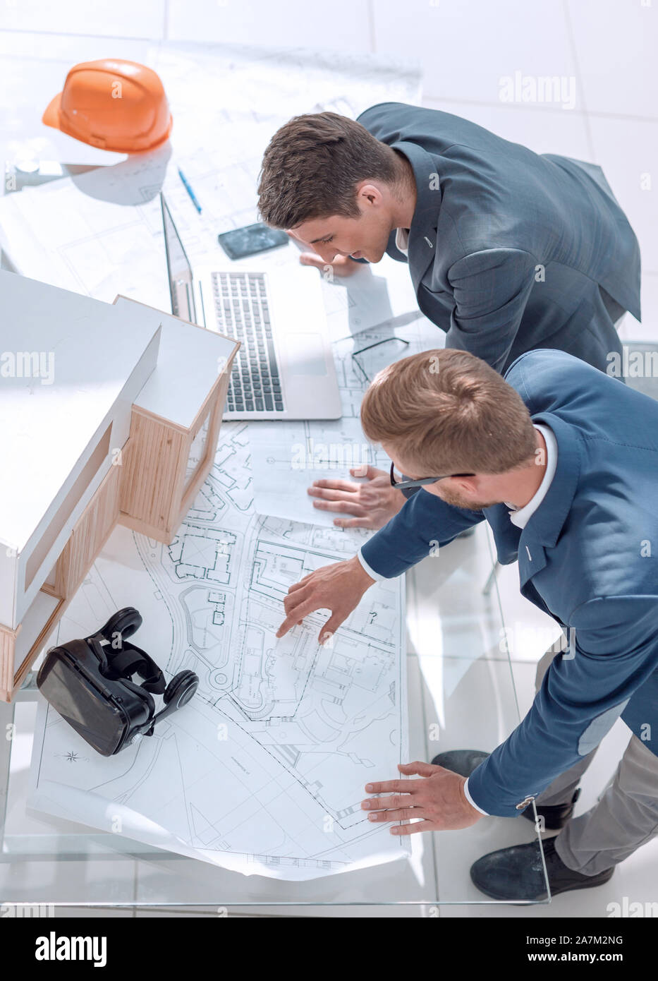 top view. smiling fellow architects looking at the camera Stock Photo ...
