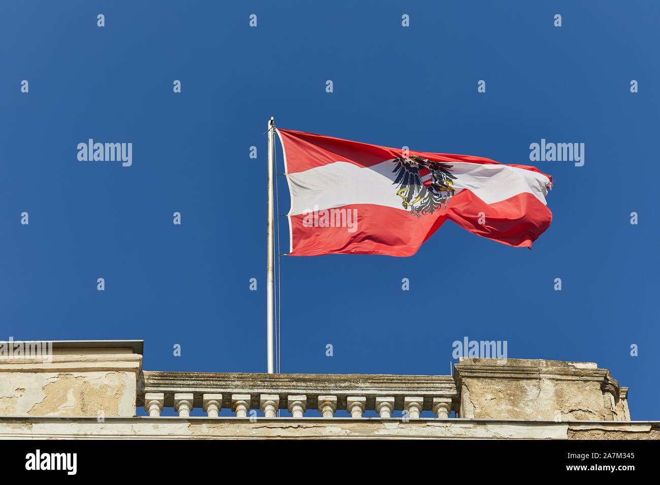 Austrian Flag In The Wind Stock Photo - Alamy