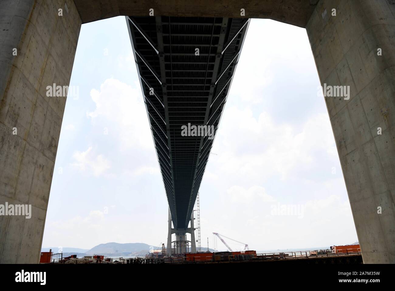 Chinese workers labor at the Pingtan Strait Road-rail Bridge, the world ...