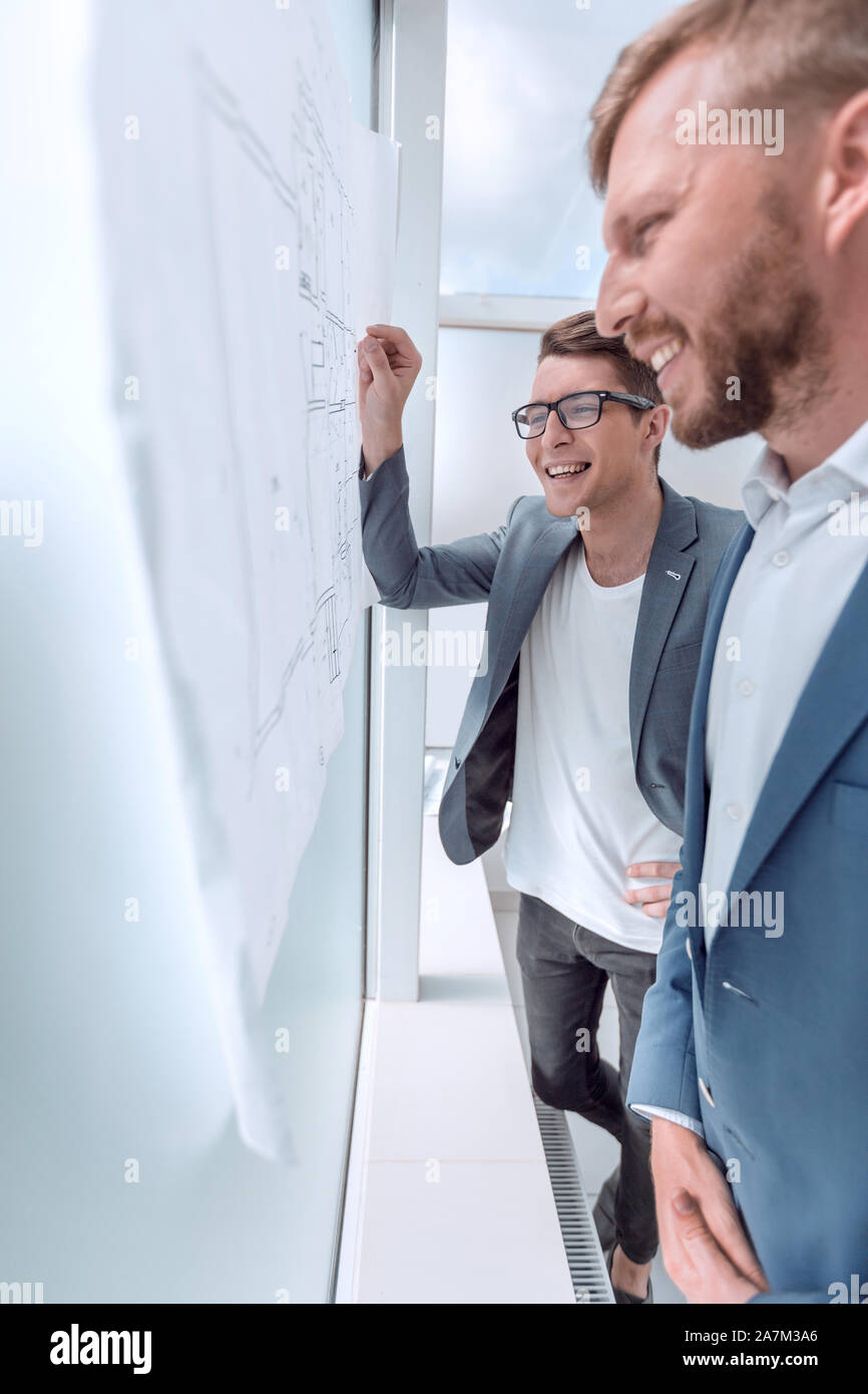 close up. smiling staff looking at the Bulletin Board Stock Photo - Alamy