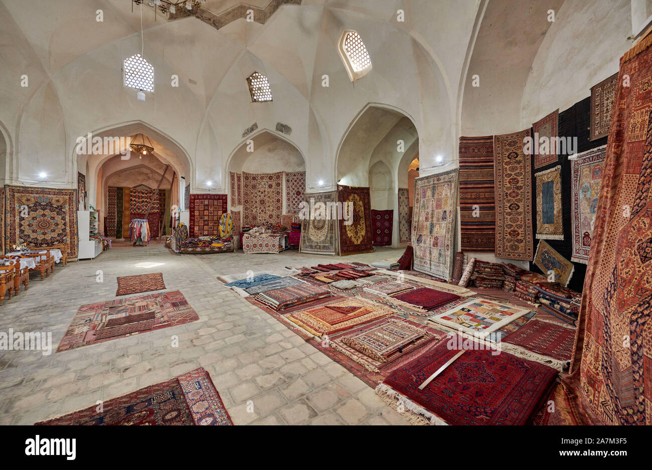 carpets inside Tim-Abdullakhan Bazaar, Ancient Trading Dome in Bukhara ...