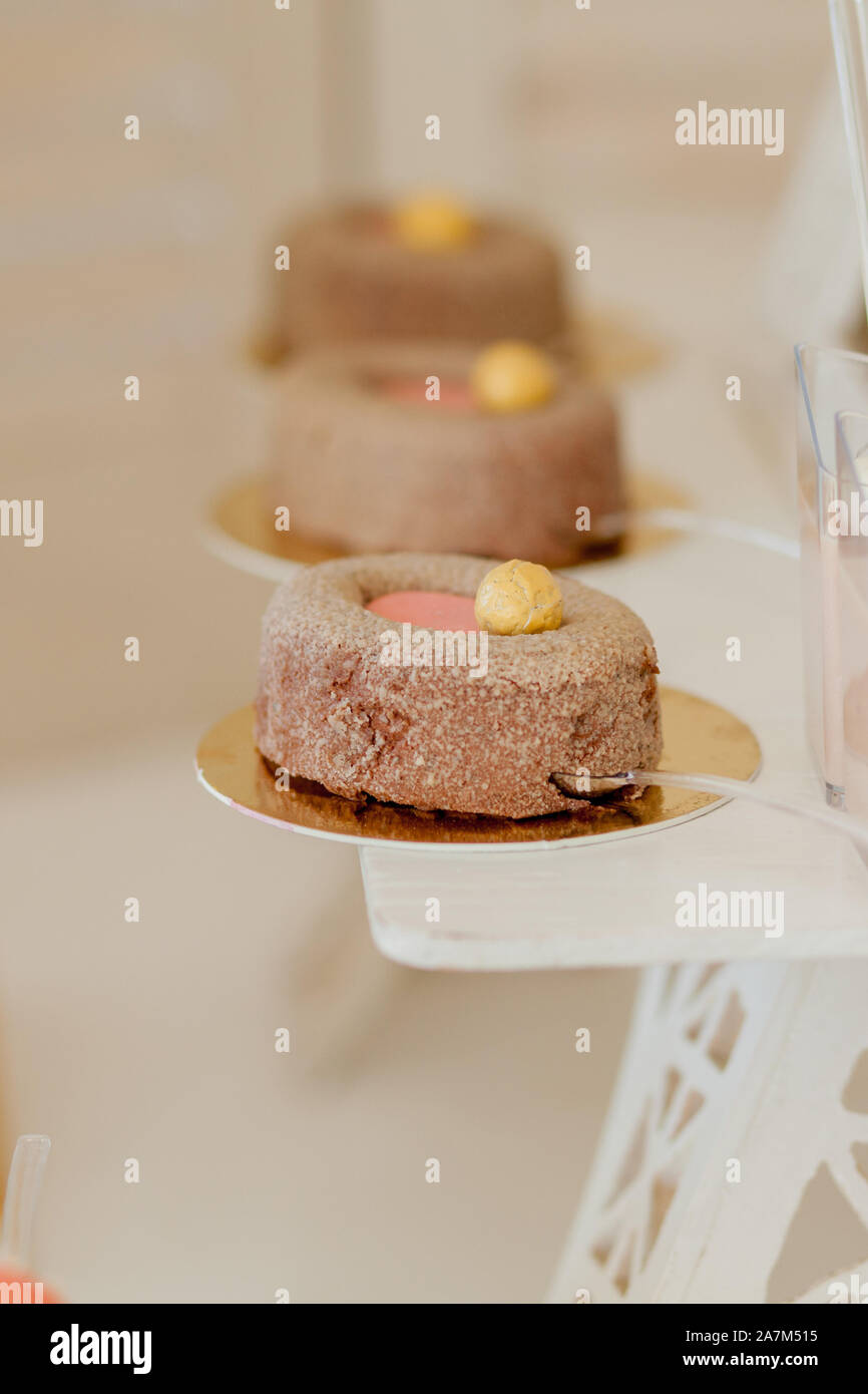 Desserts with fruits, mousse, biscuits. Different types of sweet ...