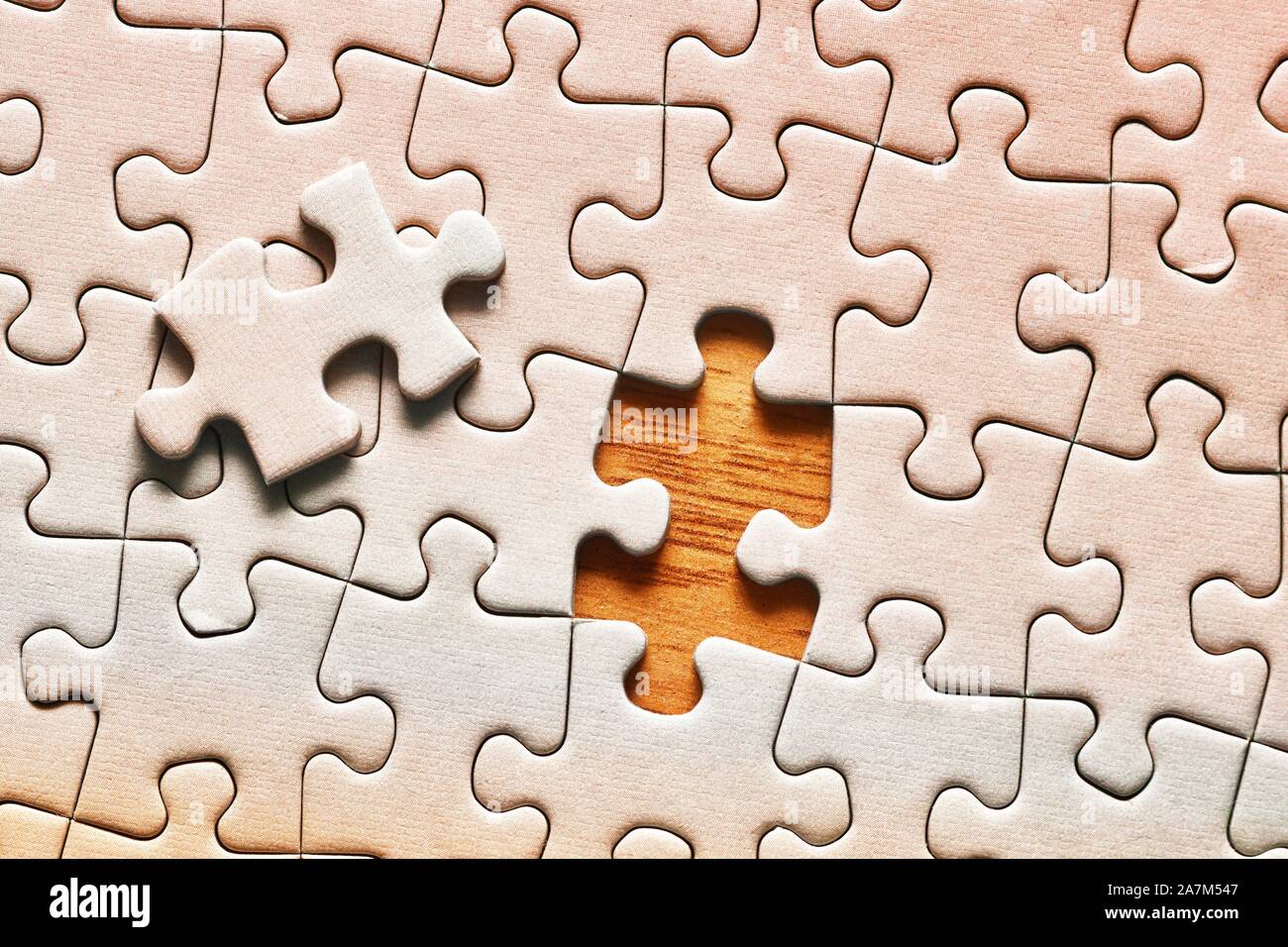 Jigsaw puzzle background, almost done Stock Photo - Alamy
