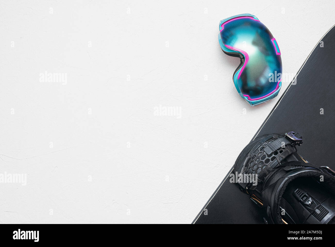 Snowboard concept flat lay background with copy space. Snowboard and ...