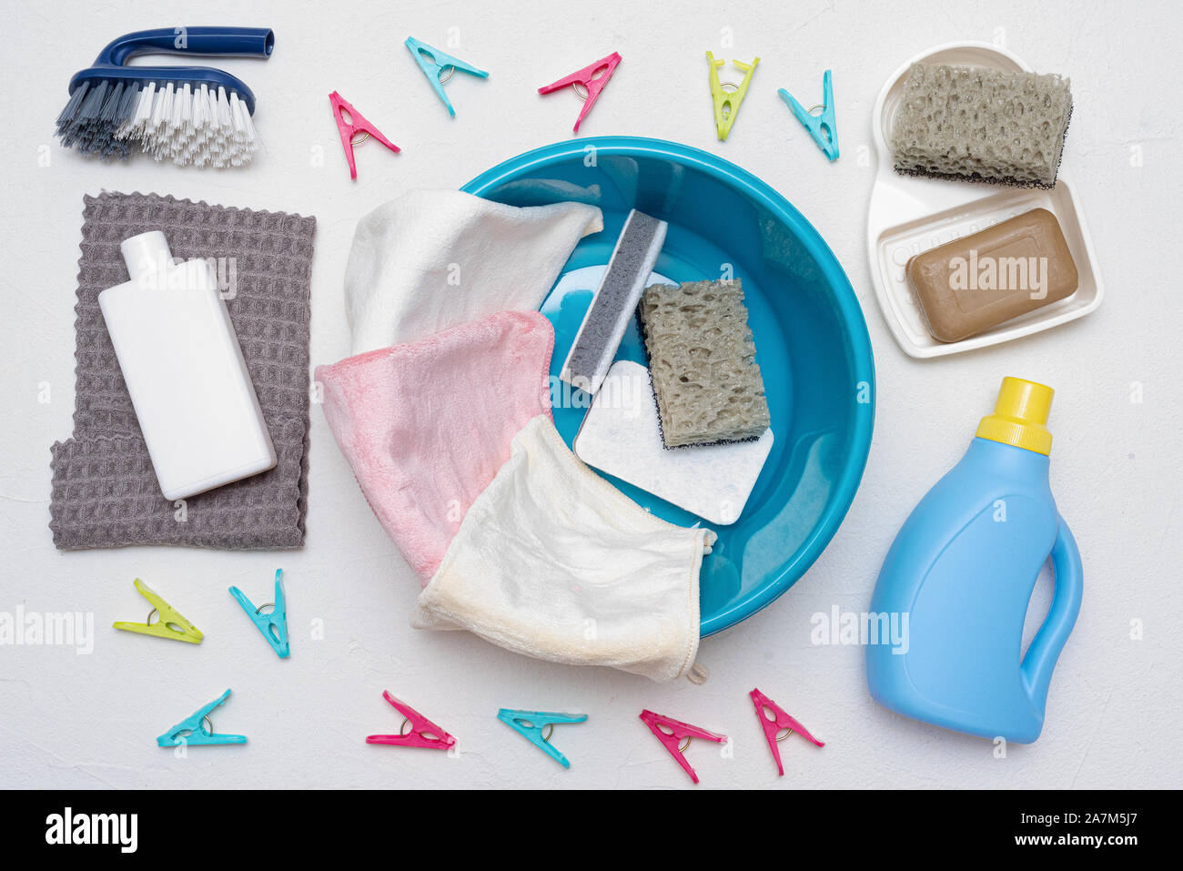 Hand wash concept. Wash basin, towel, detergent, soap, pin and brush on ...