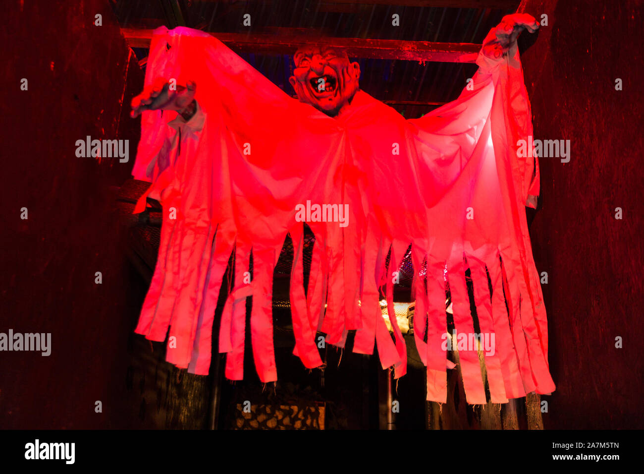 Scary ghost hovers over walkway looming menacingly Stock Photo - Alamy