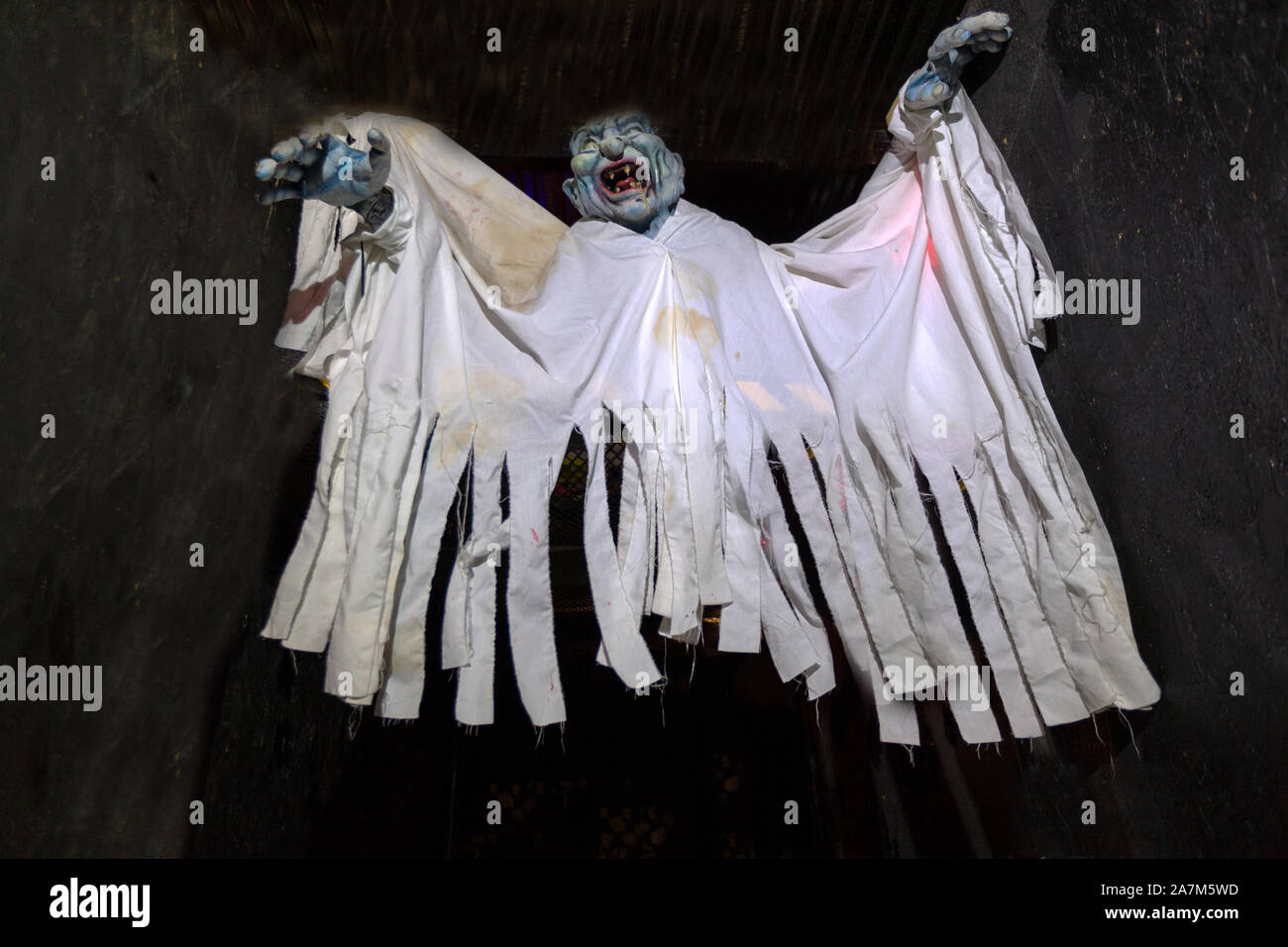 Scary ghost hovers over walkway looming menacingly Stock Photo - Alamy