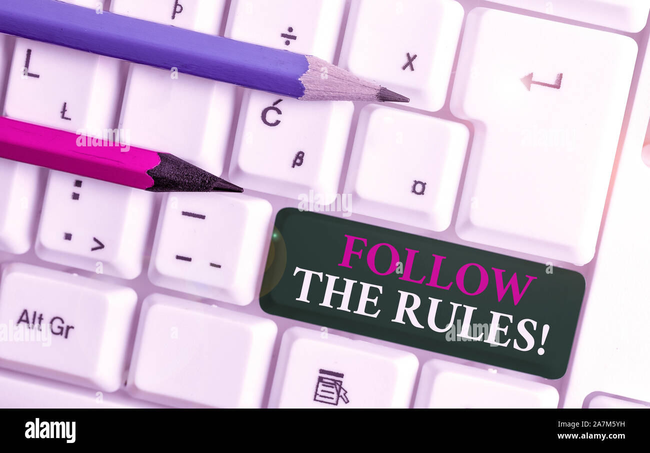 Text sign showing Follow The Rules. Business photo showcasing go with ...