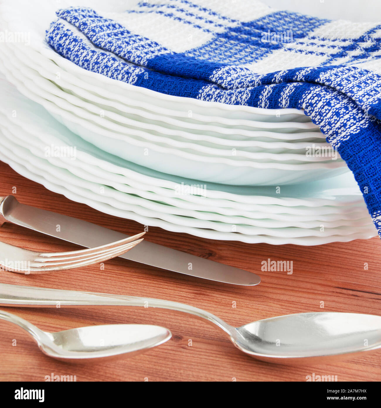 Crockery and cutlery as a background Stock Photo - Alamy