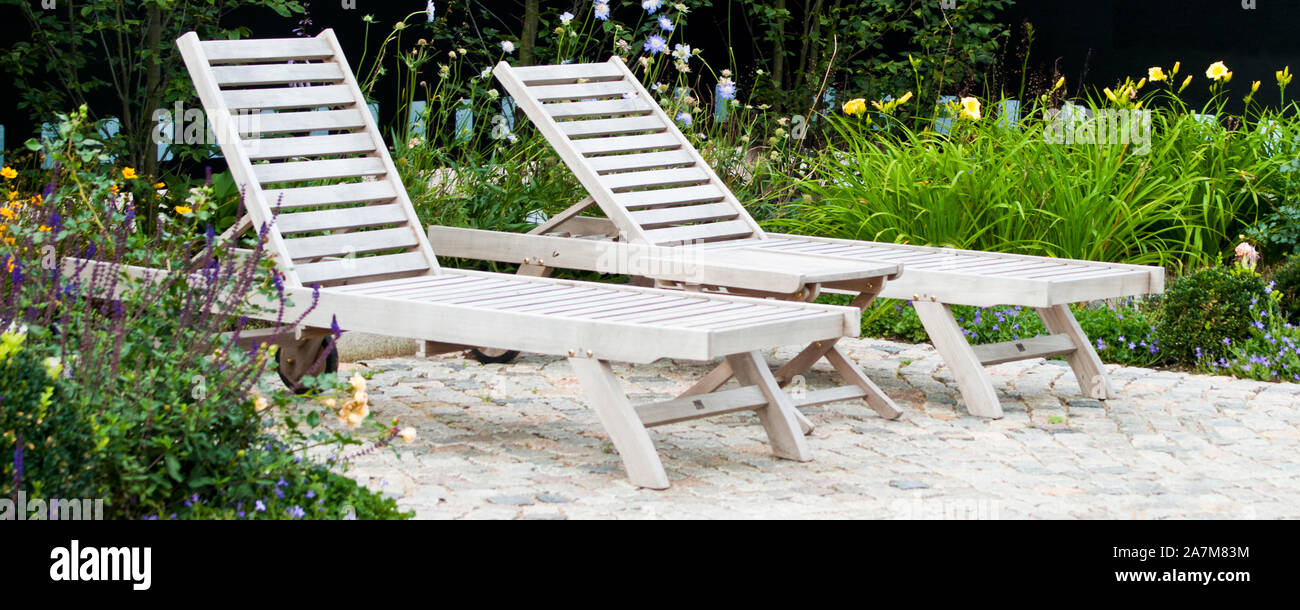 Holiday sunbathing in the garden Stock Photo - Alamy