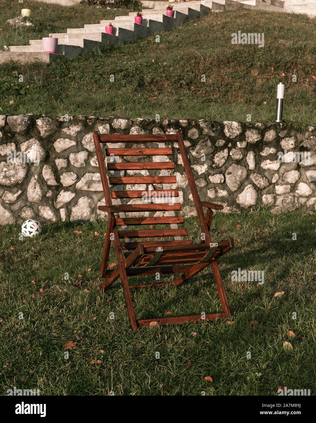 Wooden chair at back yard. Vocation time Stock Photo - Alamy