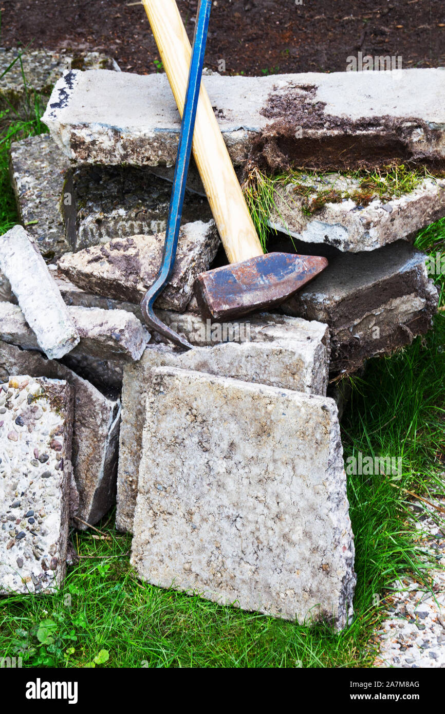 Stone slabs demolition garden design Stock Photo - Alamy
