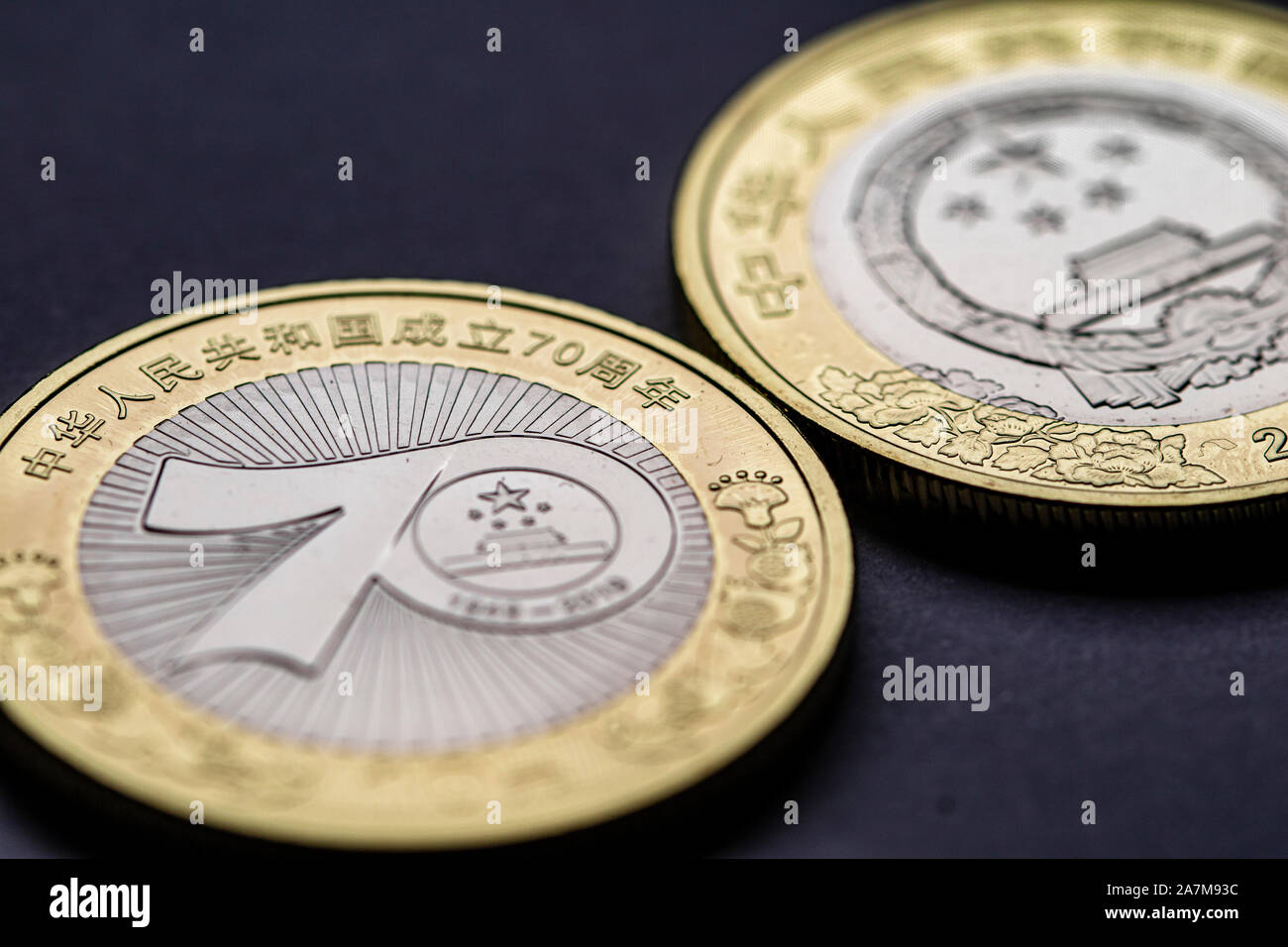 A close observation about two sides of commemorative coins issued by ...