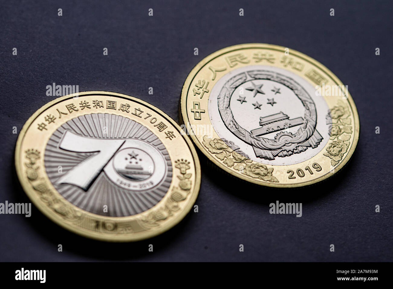 A close observation about two sides of commemorative coins issued by ...