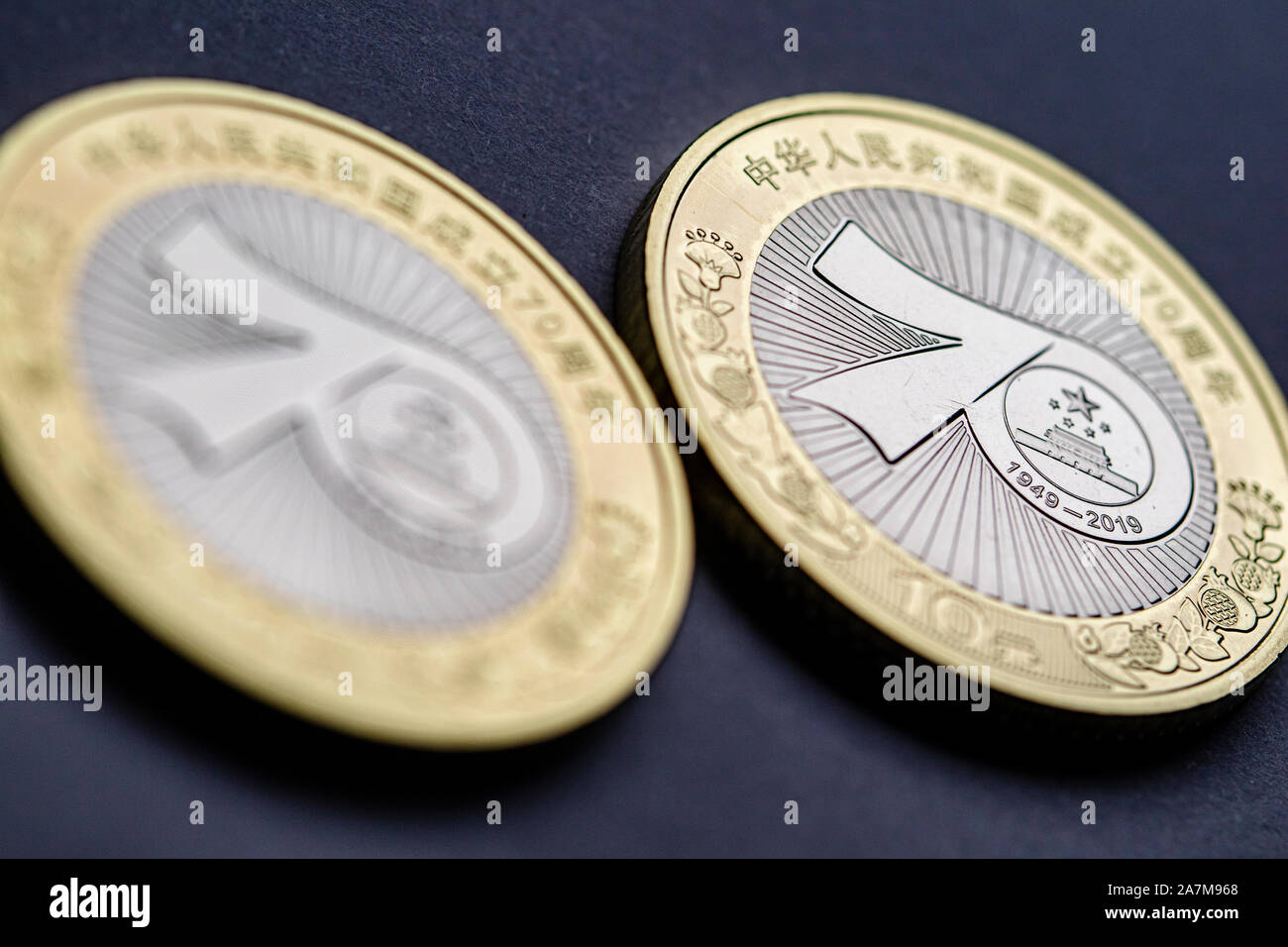 A close observation about two sides of commemorative coins issued by ...