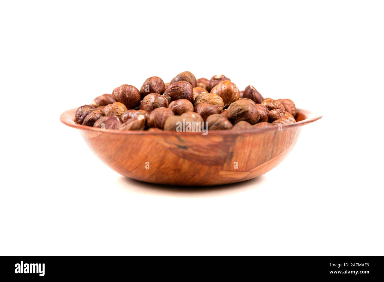Pile of whole unshelled hazelnuts isolated Stock Photo - Alamy