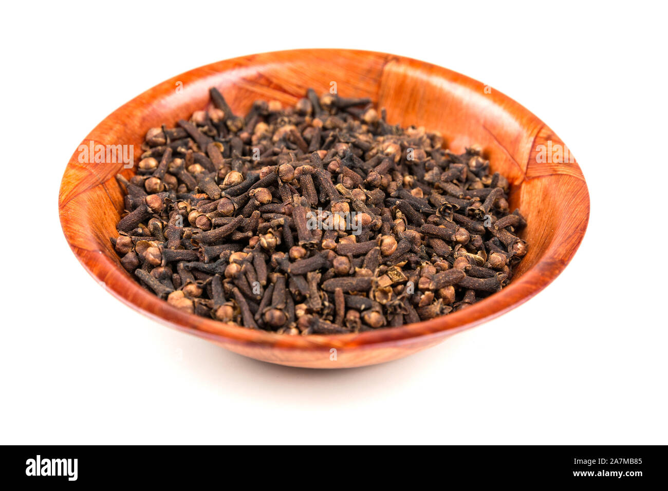 Whole clove heads and pieces isolated over white Stock Photo - Alamy