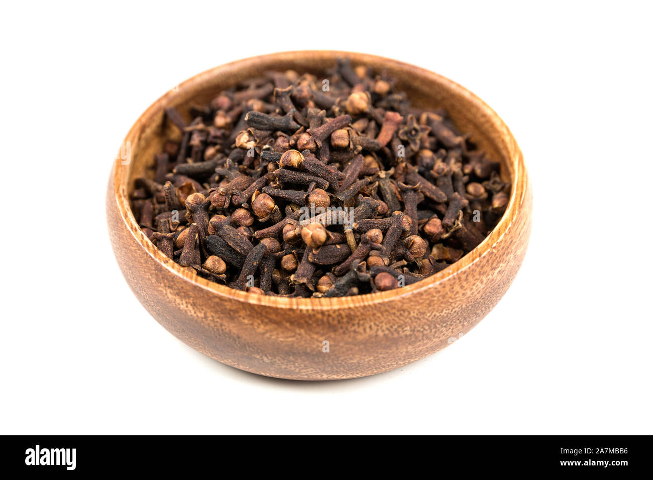 Whole clove heads and pieces isolated over white Stock Photo - Alamy