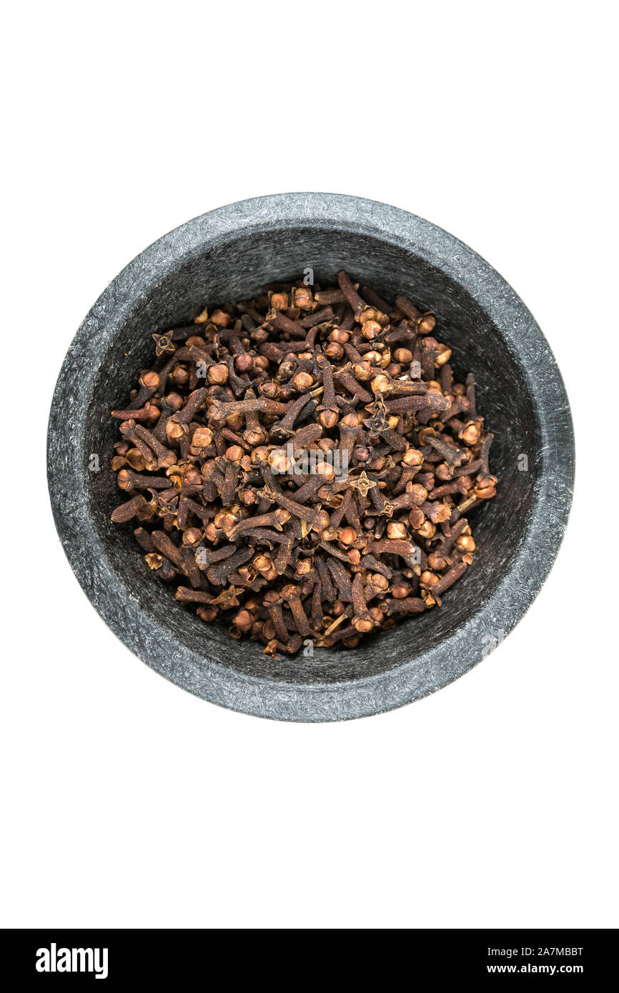 Whole clove heads and pieces isolated over white Stock Photo - Alamy