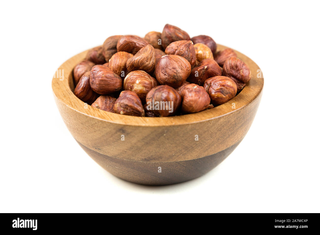 Pile of whole unshelled hazelnuts isolated Stock Photo - Alamy