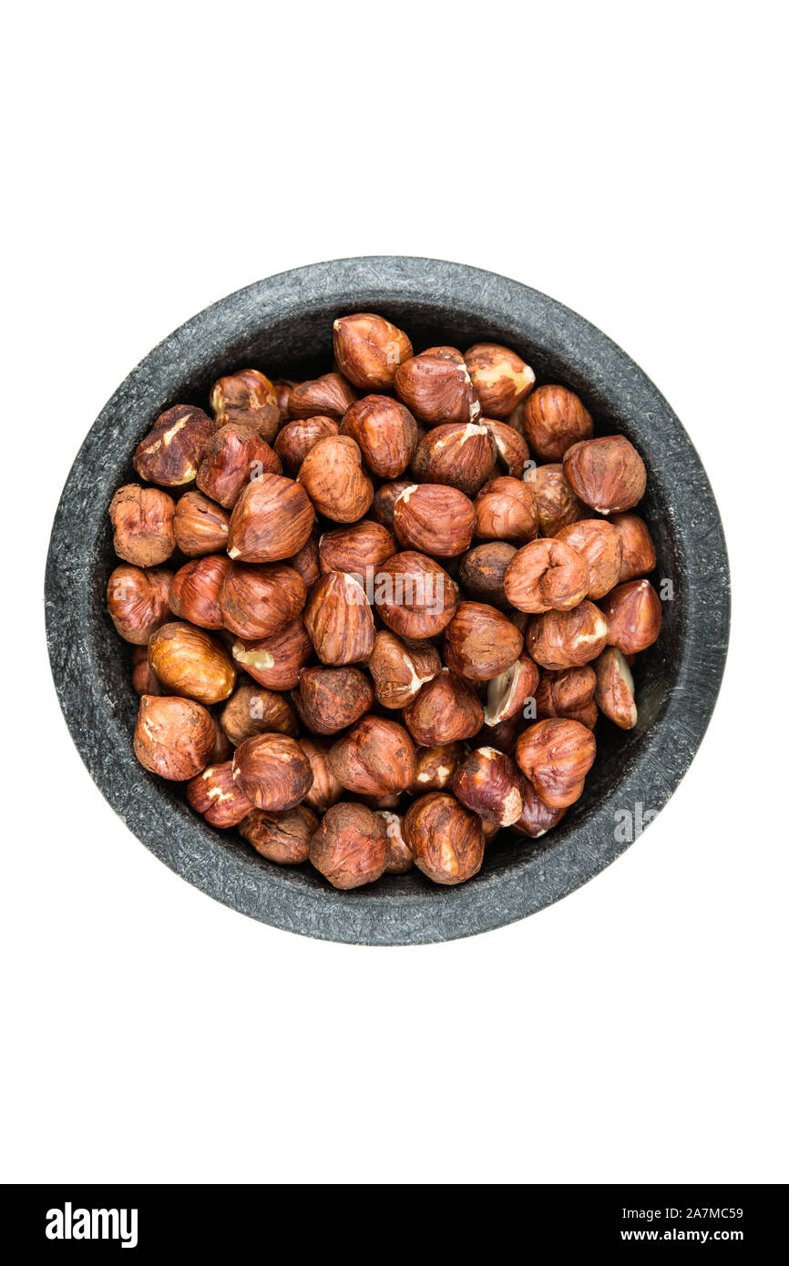 Pile of whole unshelled hazelnuts isolated Stock Photo - Alamy