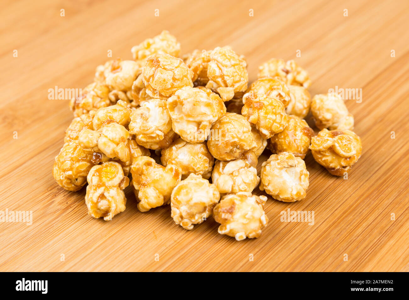 Handfuls of caramel popped popcorn kernels Stock Photo - Alamy