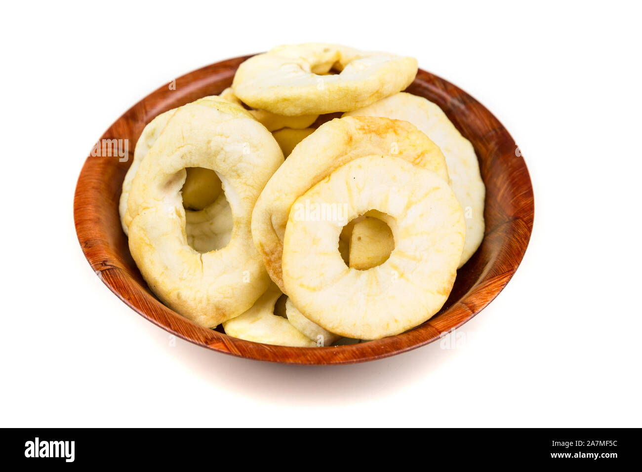 Pile of dehydrated fruity apple ring snack Stock Photo - Alamy